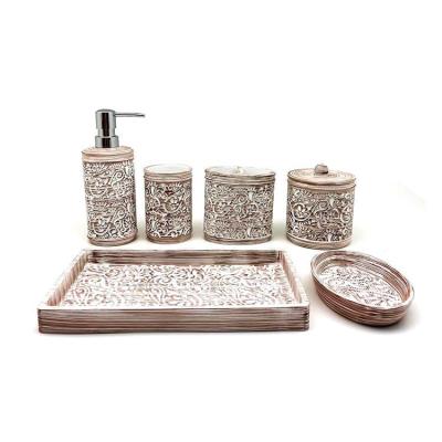 China Floral Debossed Polyresin Bathroom Accessories Countertop Toothbrush Tumbler Set Hand Print Pattern for sale