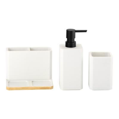 China Sand Stone Base White Polyresin Bathroom Caddy with Certification BSCI Soap Dispenser for sale