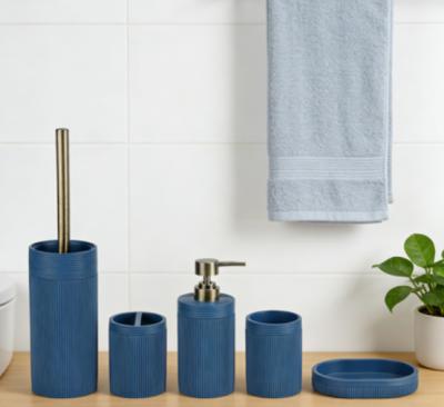 China Custom color resin bathroom accessories set round with stripe polyresin soap dispenser toilet set for sale