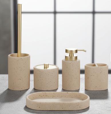 China Sand stone bathroom accessories set round with travertine look household item soap dispenser for sale
