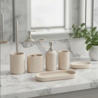 China Sand stone bathroom accessories set round with rock look resin lotion bottle with pump household item for sale