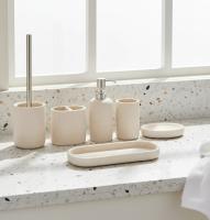 China Sand stone bathroom accessories set round with rock look resin lotion bottle with pump household item for sale