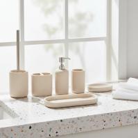 China Sand stone bathroom accessories set round with rock look resin lotion bottle with pump household item for sale