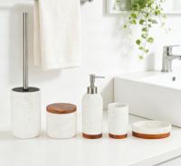 China Sand stone bathroom accessories set round with travertine look and wood accessories resin lotion pump bottle for sale