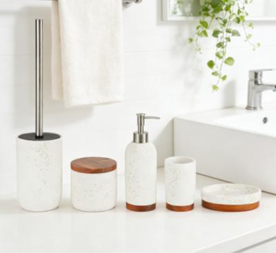 China Sand stone bathroom accessories set round with travertine look and wood accessories resin lotion pump bottle for sale