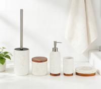 China Sand stone bathroom accessories set round with travertine look and wood accessories resin lotion pump bottle for sale