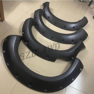 China Textured Black Wheel Arch Flares For Nissan Navara D40 05-14 4 Doors for sale