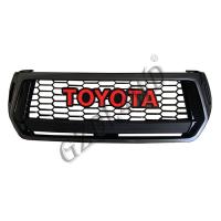 China Imitaion Carbon Fiber Front Grill Bar Toyota Hilux TRD Logo Rocco 2018 2019 for sale