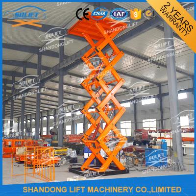 China 7M 2T Warehouse Cargo Loading Hydraulic Lift Platform Orange for sale