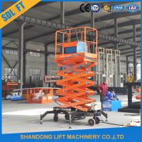 China 4 wheels Mobile Aerial Work Lift Platform Pulled Mobile Scissor Lift with CE Certificate for sale