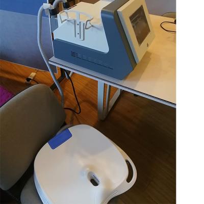 China 100Hz Emslim Beauty machineingMuscle Stimulation Device With 4 Handles for sale