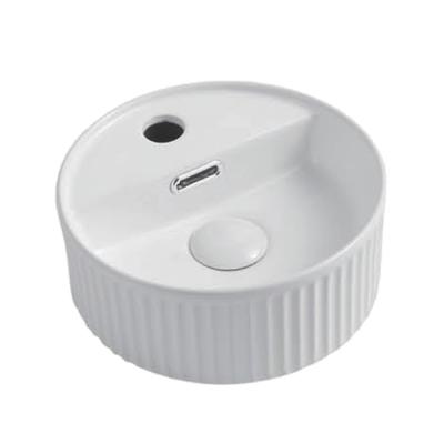 China Scratch Resistant Ceramic Wash Basin Modern Small Round Sinks Durable For Bathroom for sale