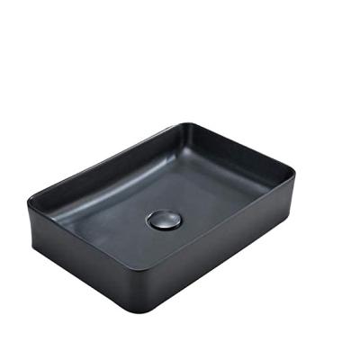 China Black Ceramic Wash Basin Compact Rectangular Wash Basin Countertop Without Overflow for sale