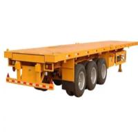 China Multi-Axle SINOTRUK 28FT 40 FT  Platform Flat Bed Semi Trailer With Higher Loading Capacity And  Longer Service Life for sale
