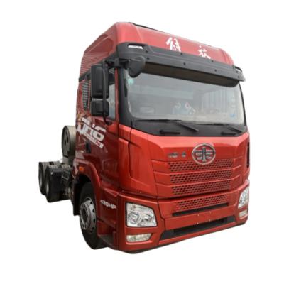 China FAW Trucks Jh6 Heavy Duty Tow Truck Manual Carrier Tractor Trucks for sale