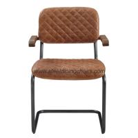 China Steel Frame Wood Armrest OEM ODM Retro Leather Dining Chairs for sale