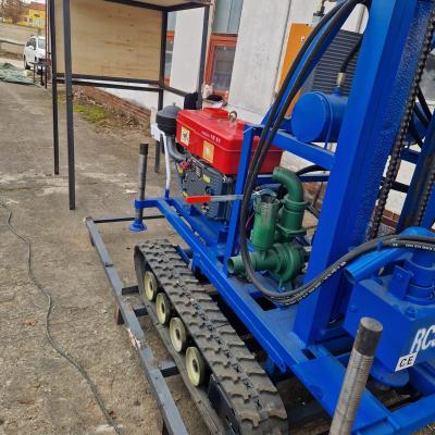 China 150m Depth Percussive And Rotating Type Rubber Crawler Mounted Water Drilling Rig for sale