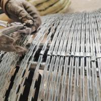 China Anti Climb Hot Dipped Galvanized Concertina Barbed Wire For Fence coil razor for sale