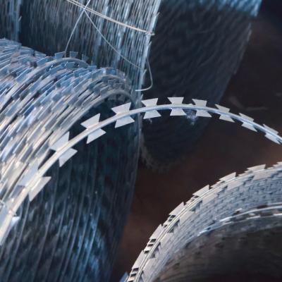 China BTO-30 Cross Razor Concertina Fencing Wire Security Coil Razor Wire Prison For Anti Climb for sale