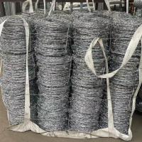 China Military Stronghold PVC Concertina Coil Wire Barbed Spiral Razor Wire for sale