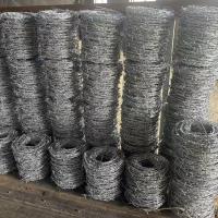 China Military Stronghold PVC Concertina Coil Wire Barbed Spiral Razor Wire for sale