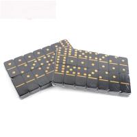 China Black And Gold Board Game Domino Set Double 9 Dominoes Set for sale