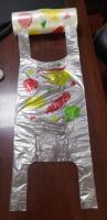 China 25x35cm T Shirt Plastic Shopping HDPE Vest Carrier Bags On A Roll White Blue for sale