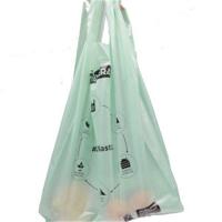 China 300 160x525mm 13mic White Plastic Shopping 100 Compostable Biodegradable T Shirt Bags for sale