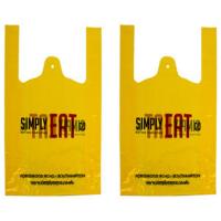 China Printed Bioplastic Shopping Bags Biodegradable T Shirt Bags With Soft Loop Handle for sale