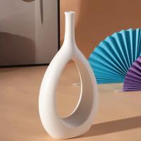 China Nordic Modern White Black Ceramic Vase 16x31cm Hollow Out Home Decor Desktop Flower Vase for sale