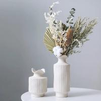 China Wholesale Handmade Modern Irregular Nordic Ceramic Vase White Matte 10x25cm Home Decor Flower Arrangement for sale
