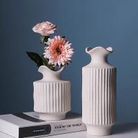 China Wholesale Handmade Modern Irregular Nordic Ceramic Vase White Matte 10x25cm Home Decor Flower Arrangement for sale