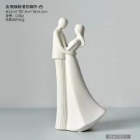 China Ceramic Love Couple Figurines 25.5cm Modern Home Decoration Wedding Gift Ornament for sale