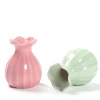 China Home Decoration Essential Oil Ceramic Aromatherapy Flower Diffuser Bottle for sale