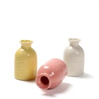 China Home Decoration Essential Oil Ceramic Aromatherapy Flower Diffuser Bottle for sale