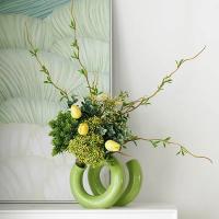 China Modern Ceramic Hollow Donut Flower Vase Twist Pipe Shape Home Decor 22.6x17.7x18cm for sale