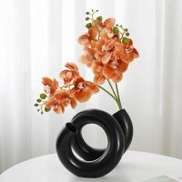China Modern Ceramic Hollow Donut Flower Vase Twist Pipe Shape Home Decor 22.6x17.7x18cm for sale