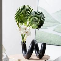 China Modern Ceramic Hollow Donut Flower Vase Twist Pipe Shape Home Decor 22.6x17.7x18cm for sale