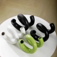 China Modern Ceramic Hollow Donut Flower Vase Twist Pipe Shape Home Decor 22.6x17.7x18cm for sale