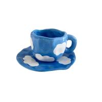 China Hand-painted Ceramic Coffee Cup and Saucer Set 250ml Irregular Mug with Blue Sky White Clouds Design for sale