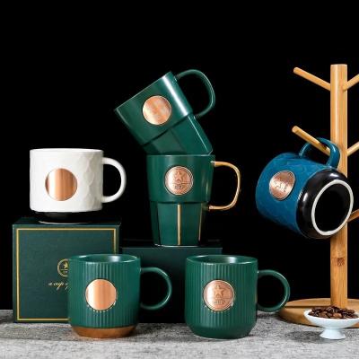 China Wholesale Custom Logo Ceramic Mug with Copper Inlay 450ml Hammered Moscow Mule Cup for sale