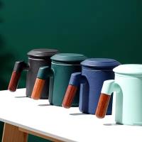 China Custom Ceramic Tea Cup 400ml with Wooden Handle and Infuser Lid Personalized Logo Mug for sale