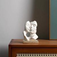 China Custom Ceramic Abstract Couple Statue 11cm Home Decor Wedding Gift White Figurine for sale