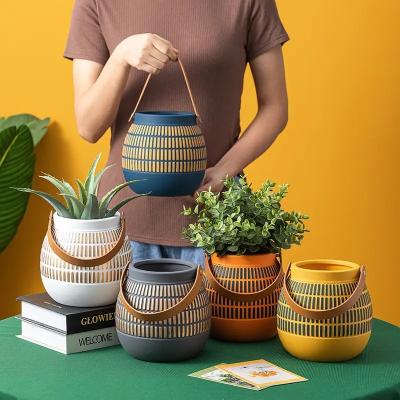 China Ceramic Hanging Planter 16x12x15.5cm for Succulents Air Plants Home Garden Decor Flower Basket with Leather Strap for sale