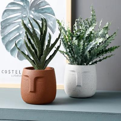 China 5.5 Inch Nordic Abstract Human Face Cement Succulent Flowerpot for Home Garden Planters 12.5x14 cm for sale