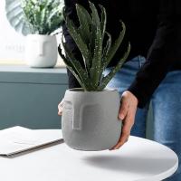 China 5.5 Inch Nordic Abstract Human Face Cement Succulent Flowerpot for Home Garden Planters 12.5x14 cm for sale