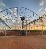 China Hot Galvanized Steel Structure Plastic Film Greenhouses Multi Span Agricultural for sale