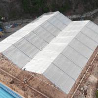 China Single Layer Stable Structure Poly Tunnel Greenhouse for Agricultural Retractable Film Automated for sale