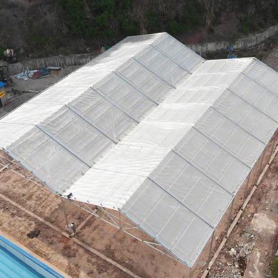 China Galvanized Steel Plastic Film Greenhouse Retractable Large Tunnel Custom for sale