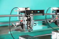 China 1200RPM Computer Flat Embroidery Machine 12 Head For Fabrice And Clothes for sale